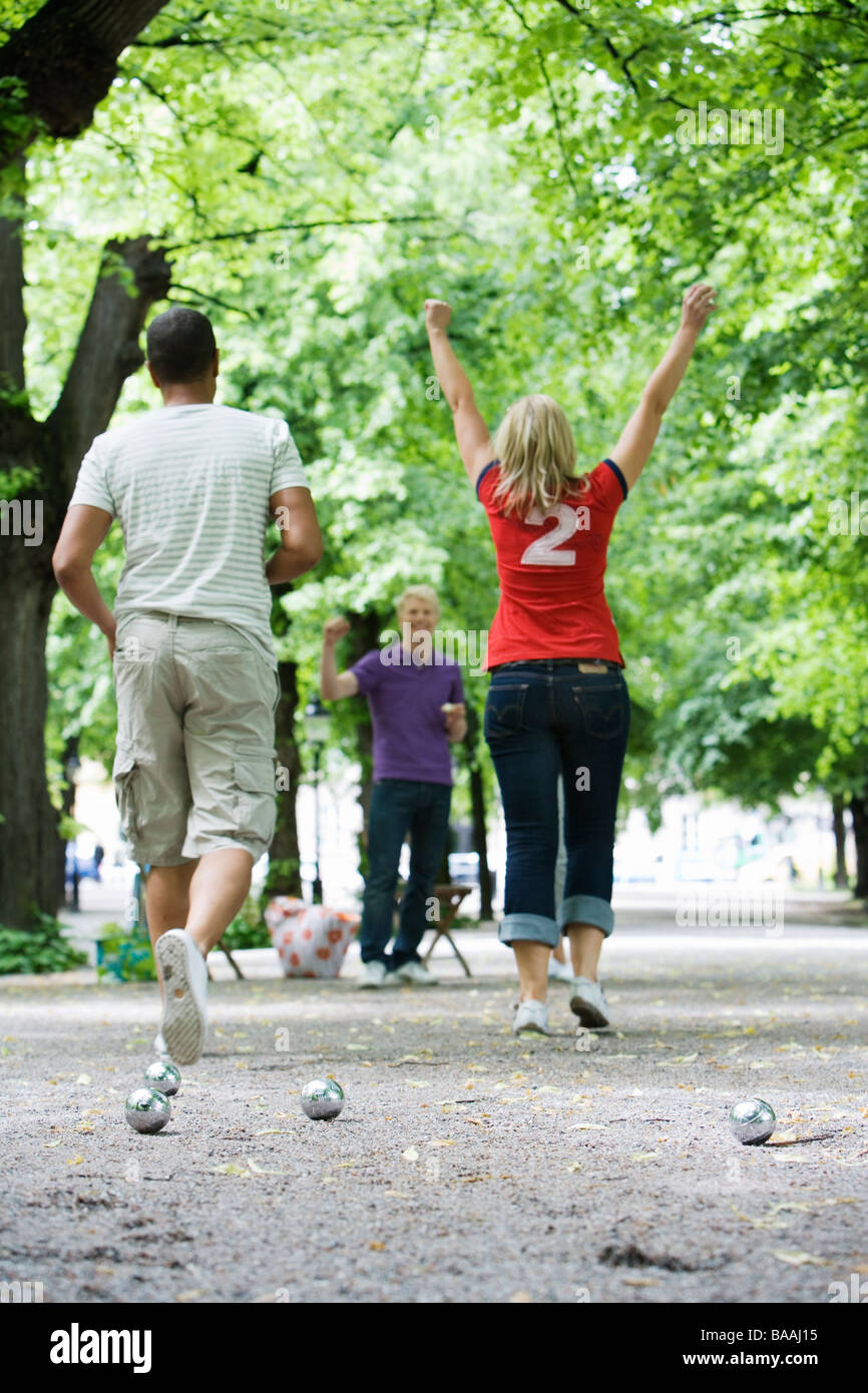 Three people playing boules, Stockholm, Sweden Stock Photo - Alamy