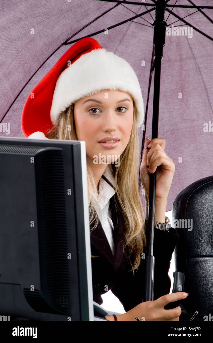 professional woman wearing christmas hat Stock Photo - Alamy