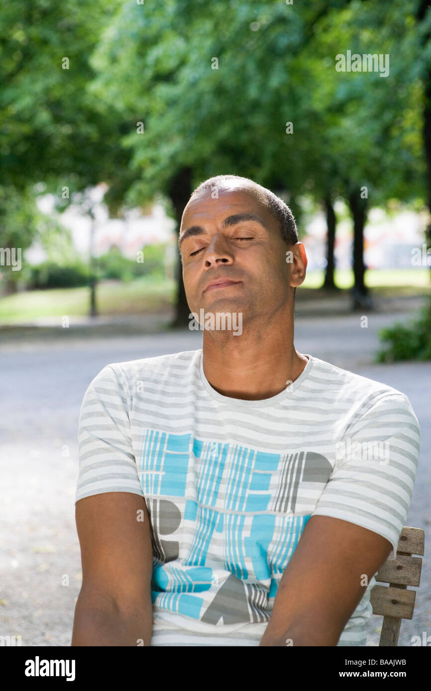 Portrait of a man enjoying the sun, Stockholm, Sweden Stock Photo - Alamy