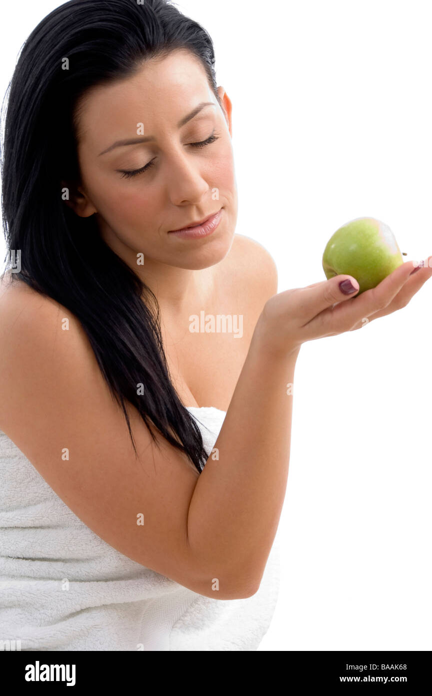 side view of woman posing with apple Stock Photo - Alamy