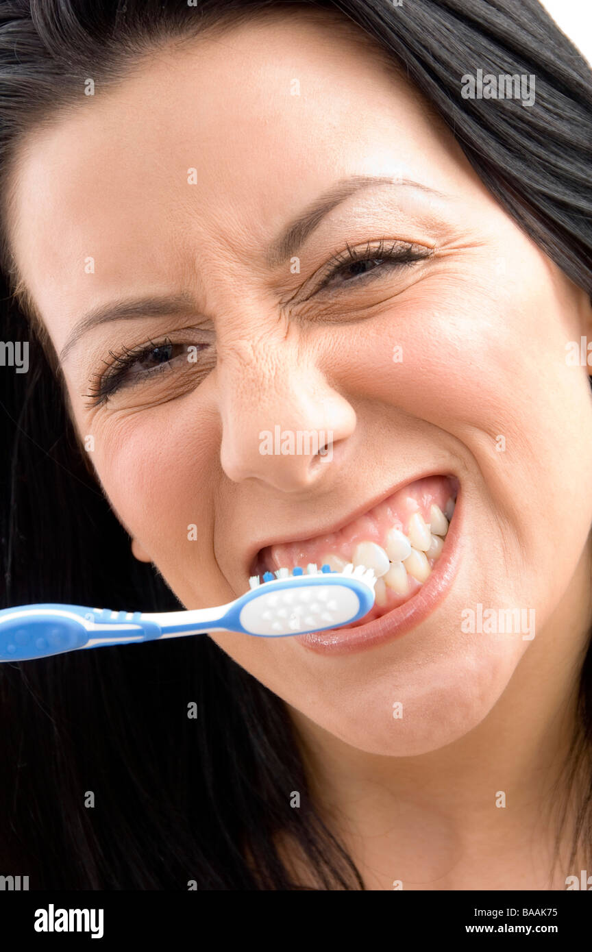 close up of woman brushing her teeth Stock Photo - Alamy
