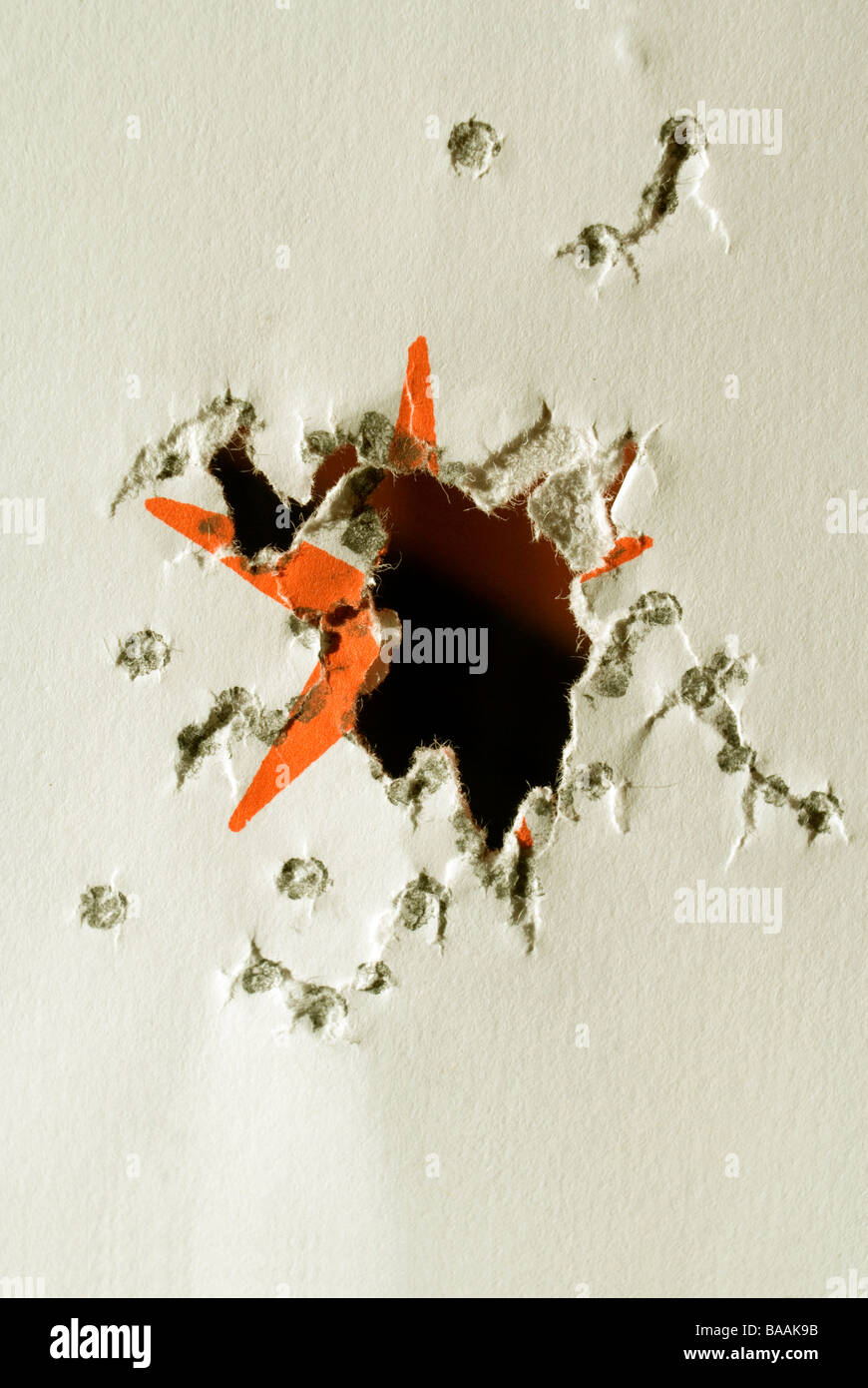 A used paper target from a carnival stall. The red star must be ...