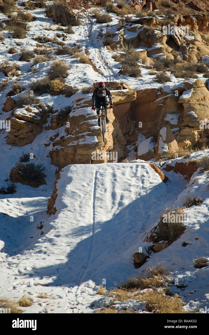 Mountain biker jumping with snowy landing in Moab, Utah Stock Photo - Alamy