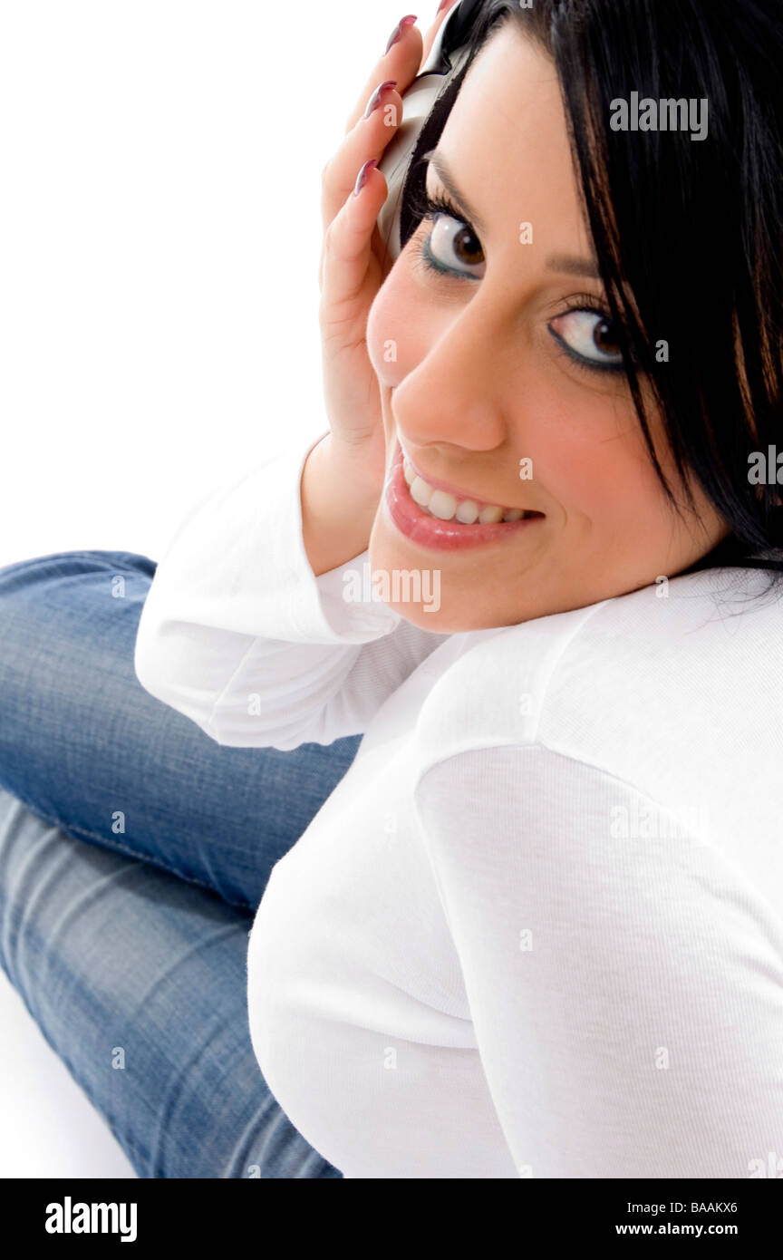 half length view of model listening music on white background Stock ...