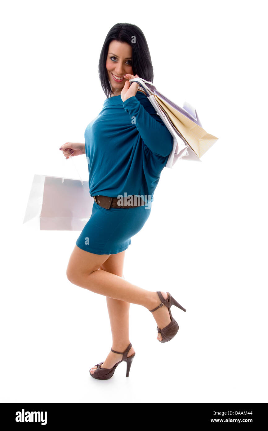 Side pose model holding shopping Cut Out Stock Images & Pictures - Alamy