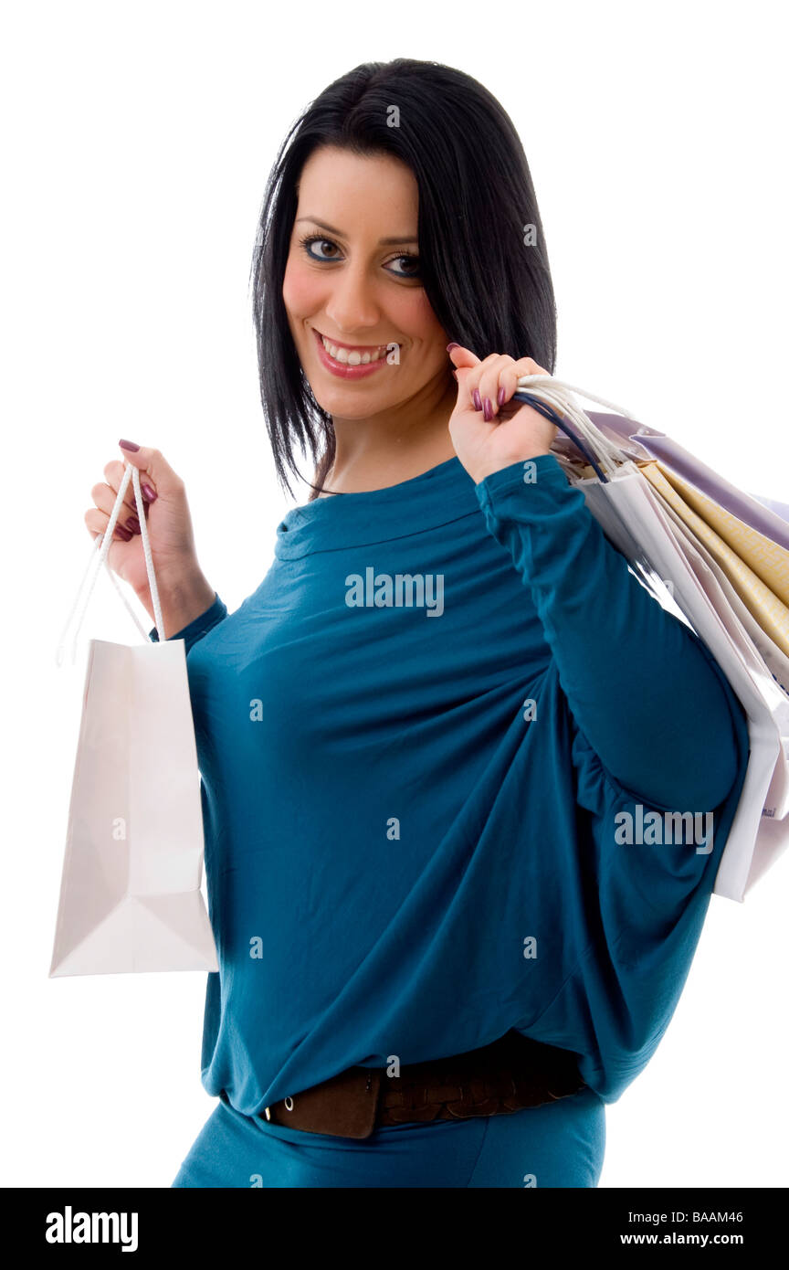 side pose of smiling model with carry bags Stock Photo - Alamy