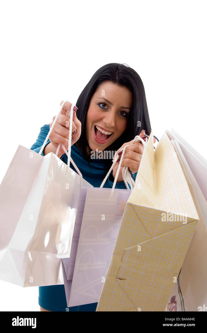 front view of cheerful woman showing carry bags Stock Photo - Alamy