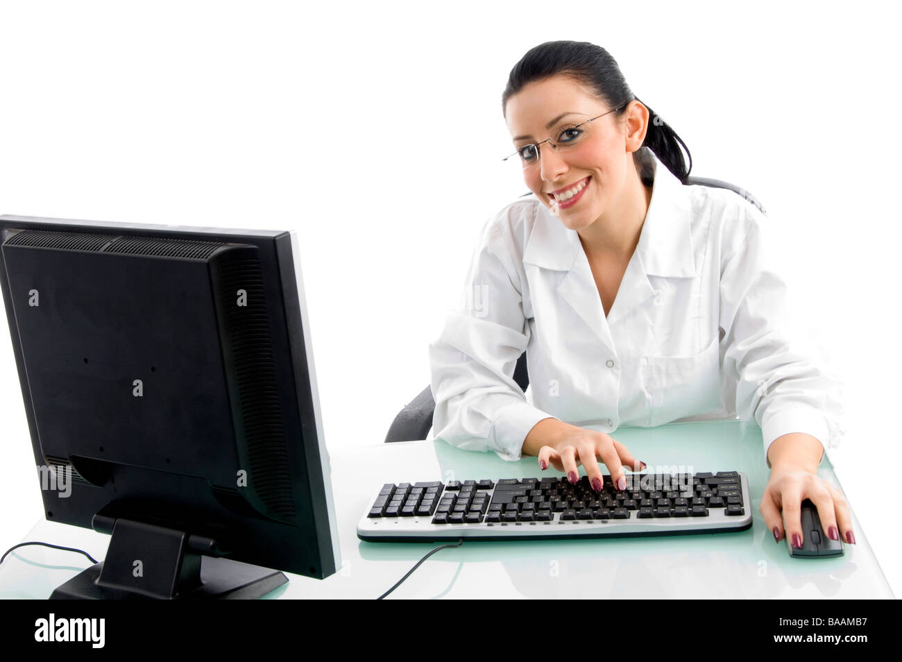 front view of smiling doctor working on computer on white backgr Stock ...