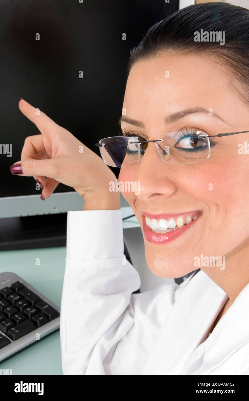 side view of smiling pointing doctor Stock Photo - Alamy