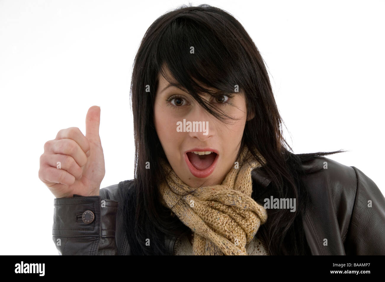 woman giving shocking expression with thumbs up Stock Photo - Alamy