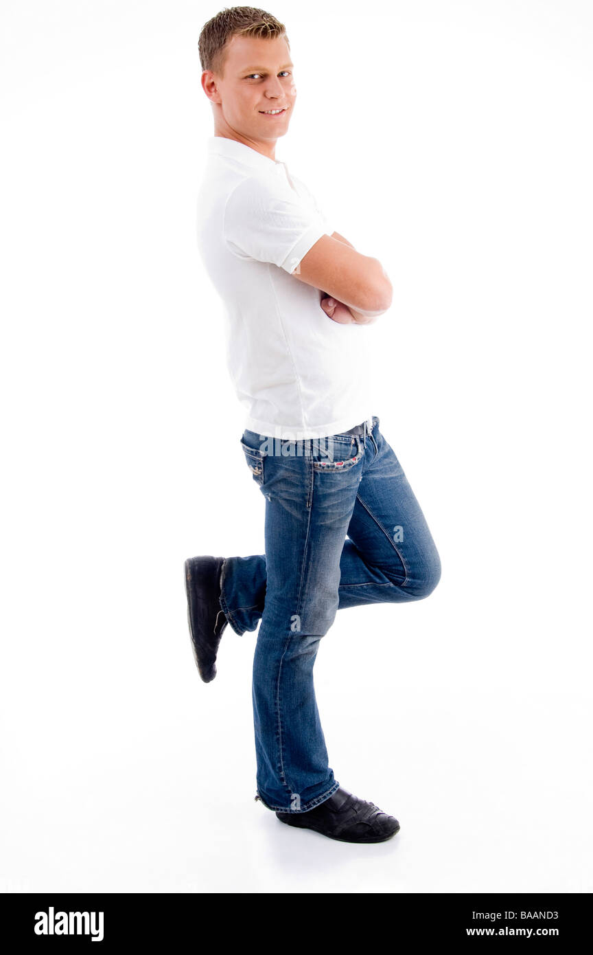 handsome man standing on one leg Stock Photo - Alamy
