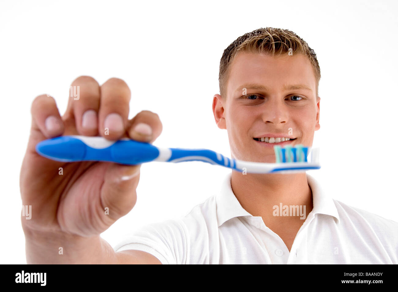 man showing his toothbrush Stock Photo - Alamy