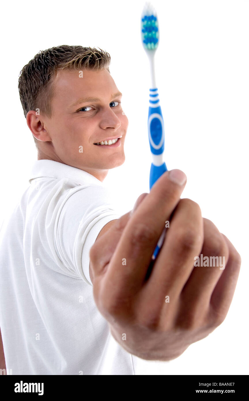 man showing his toothbrush Stock Photo - Alamy