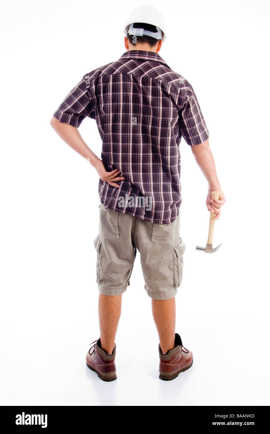 back pose of worker holding hammer Stock Photo - Alamy