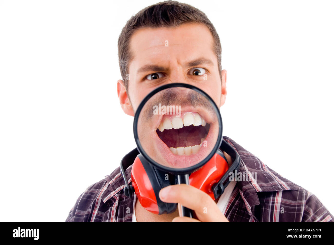 male showing teeth through magnifying glass Stock Photo - Alamy