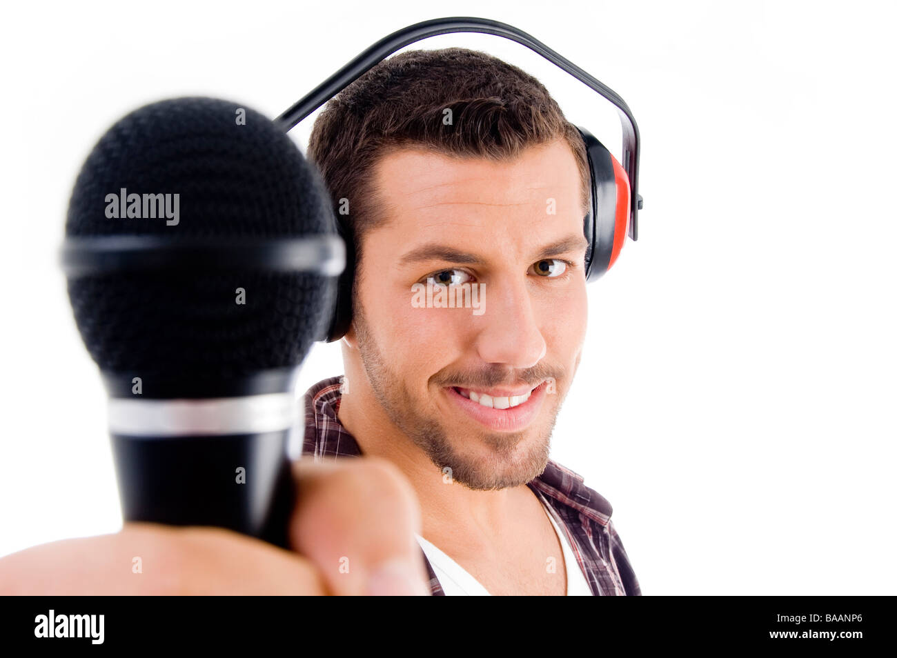 smiling male holding microphone Stock Photo - Alamy