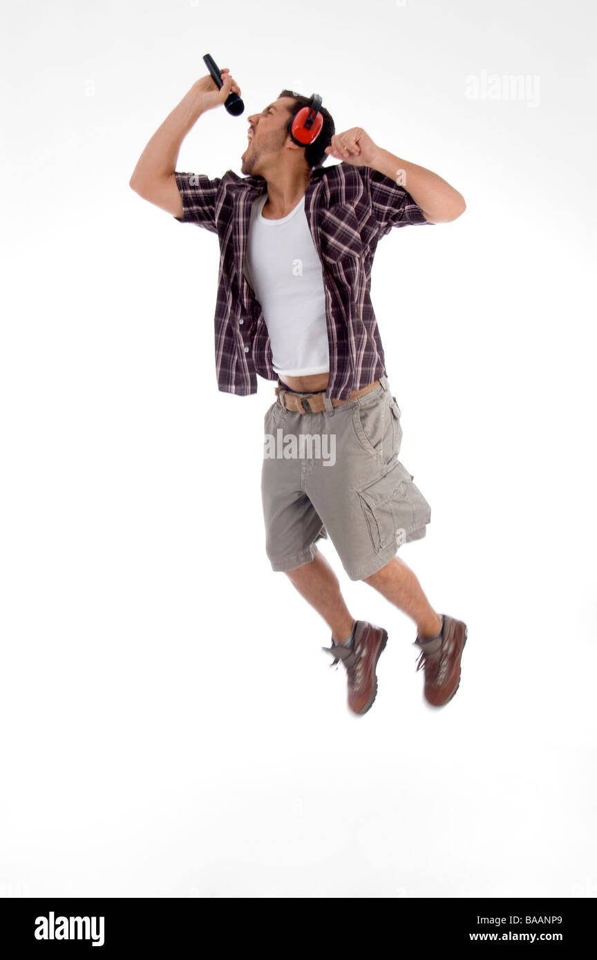young singer singing a song in rock style Stock Photo - Alamy