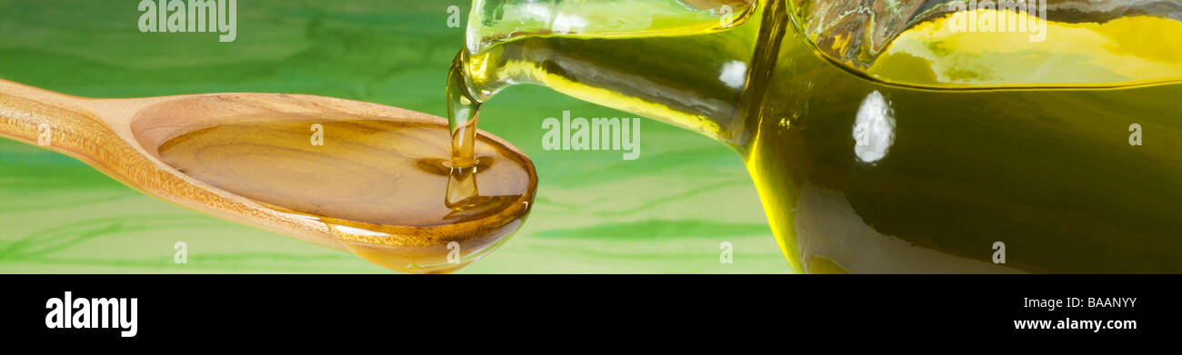 Pouring olive oil Stock Photo - Alamy