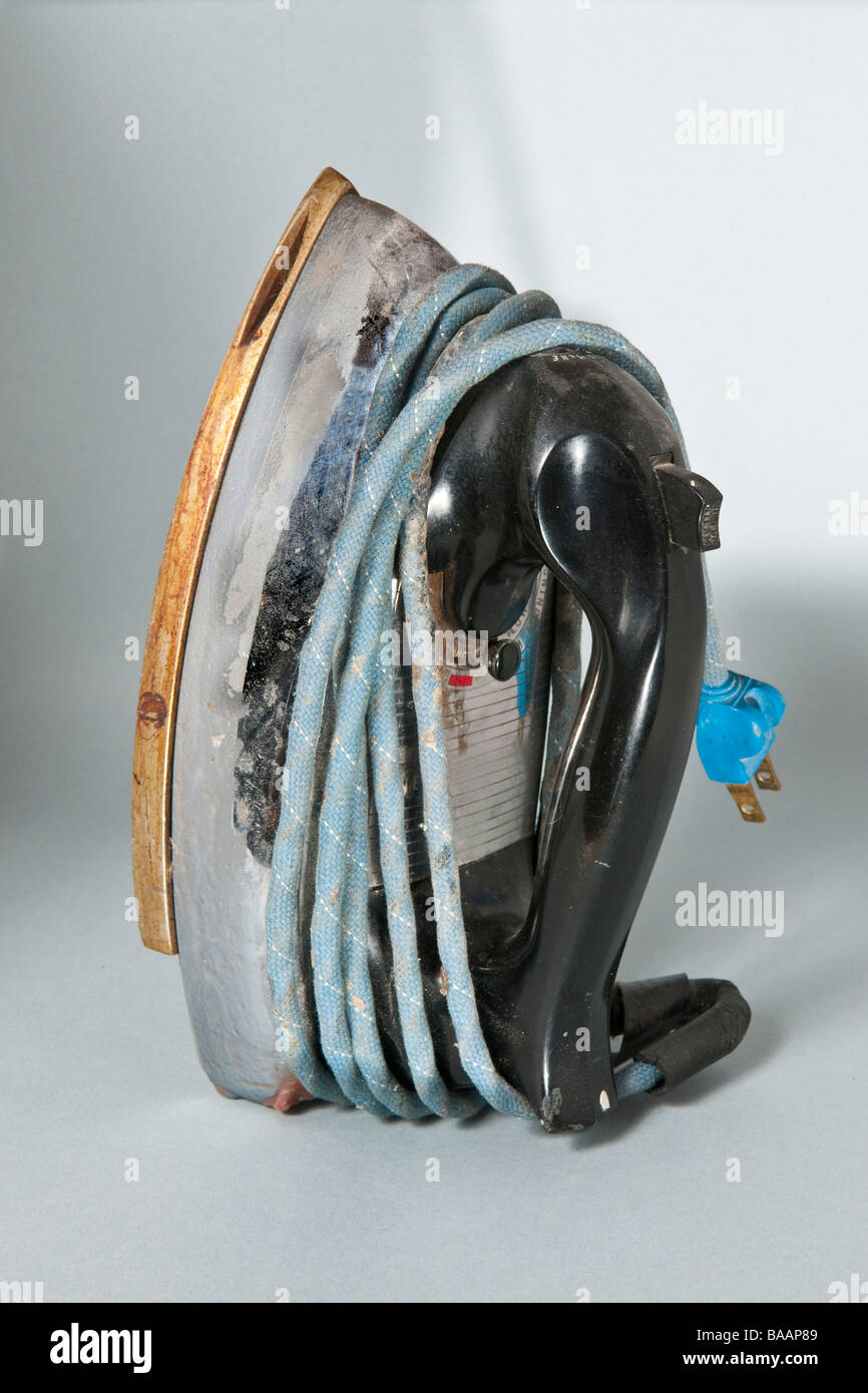 old worn steam iron Stock Photo - Alamy