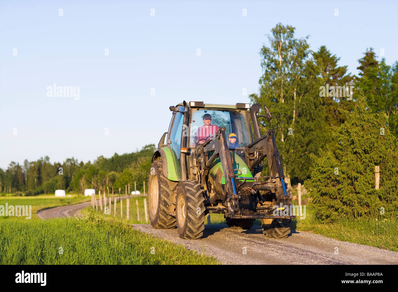 A farmer and a tractor, Sweden Stock Photo - Alamy