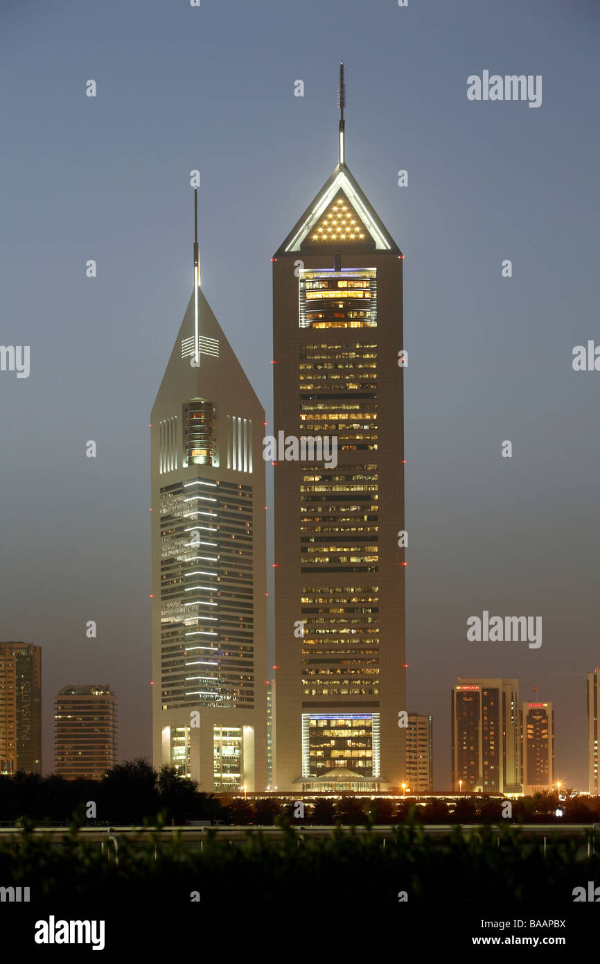The Emirates Towers illuminated at night, Dubai, United Arab Emirates ...