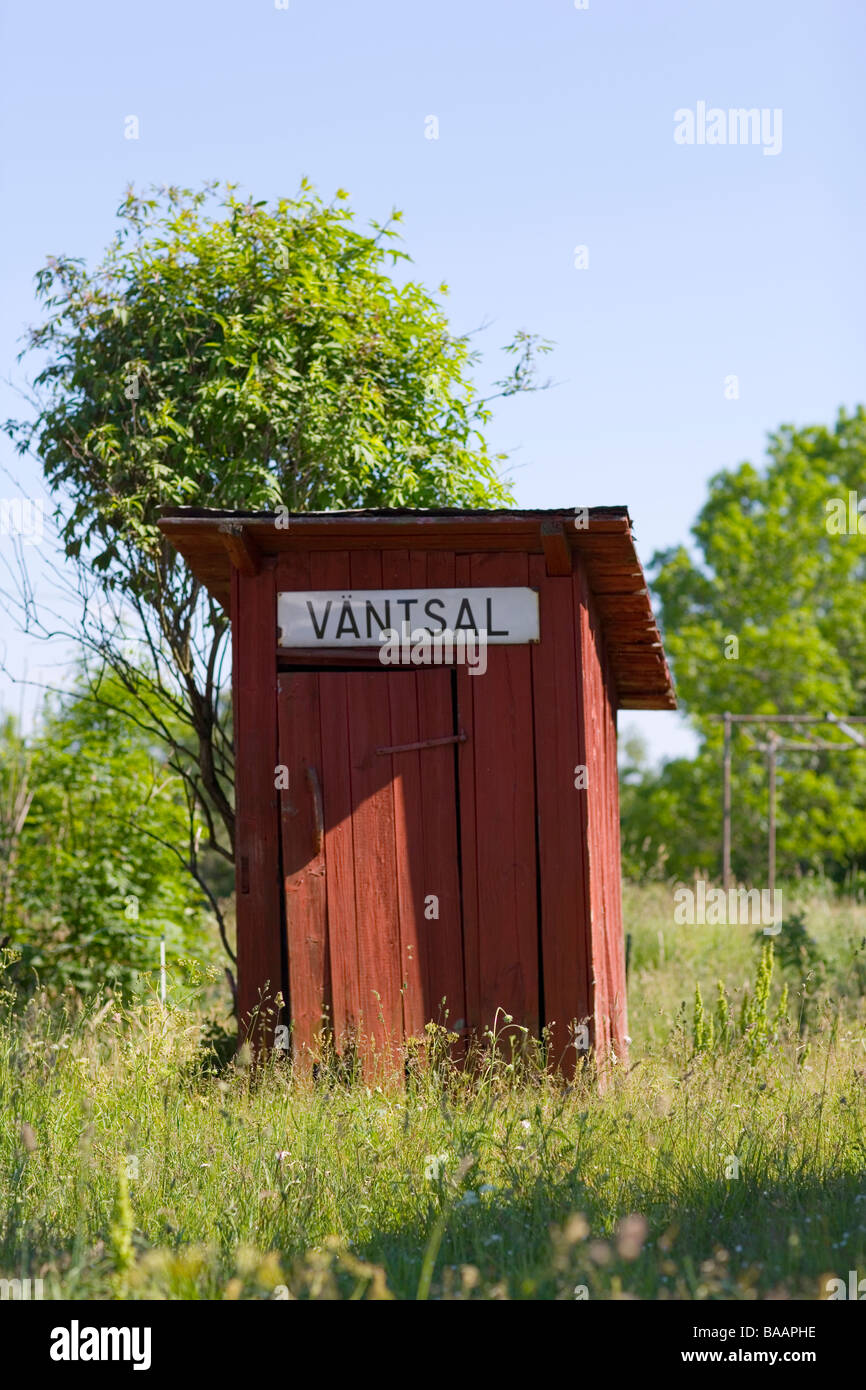 A red outhouse, Sweden Stock Photo - Alamy