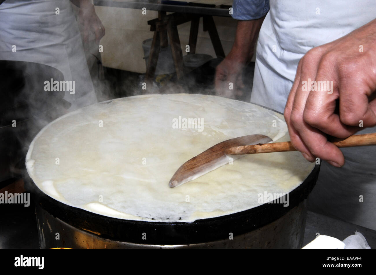 A French style galette being made by a chef on a mobile stand Stock ...