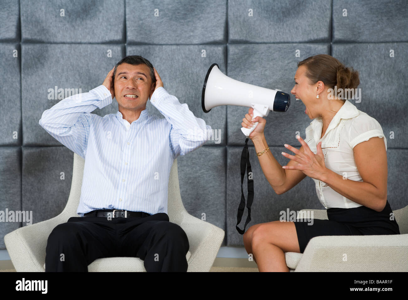 A woman yelling in a megaphone, Sweden Stock Photo - Alamy