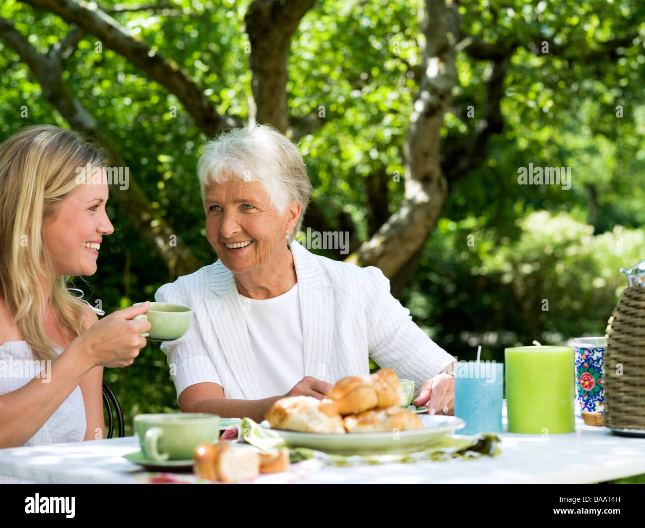 Two women sitting at a table, Stockholm, Sweden Stock Photo - Alamy