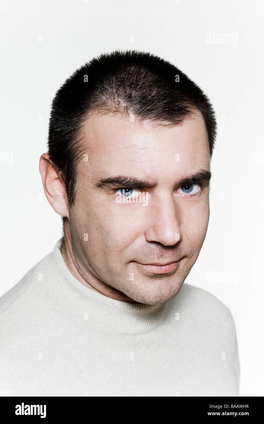 Portrait of an handsome expressive man in studio on white isolated ...