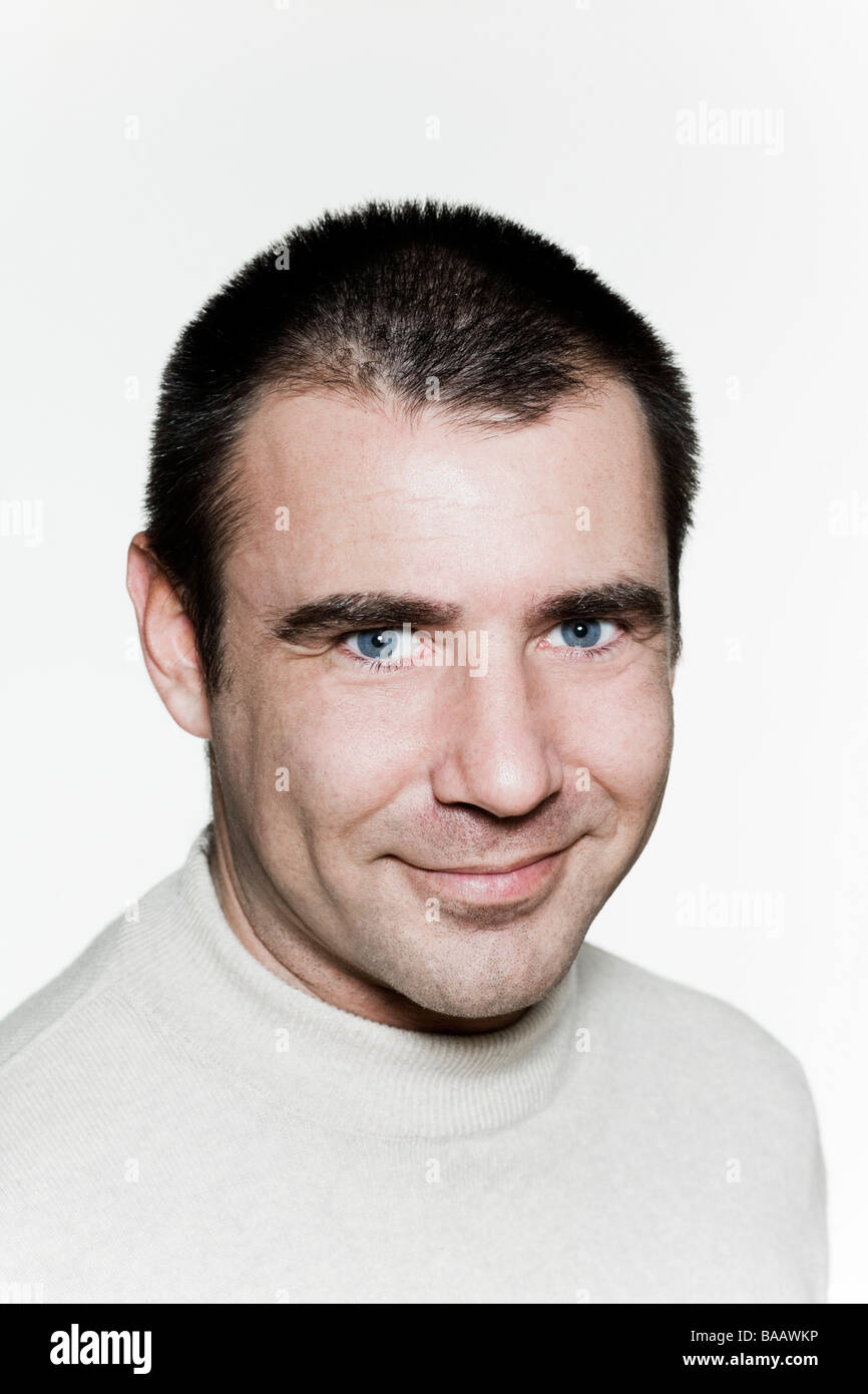 Portrait of an handsome expressive man in studio on white isolated ...