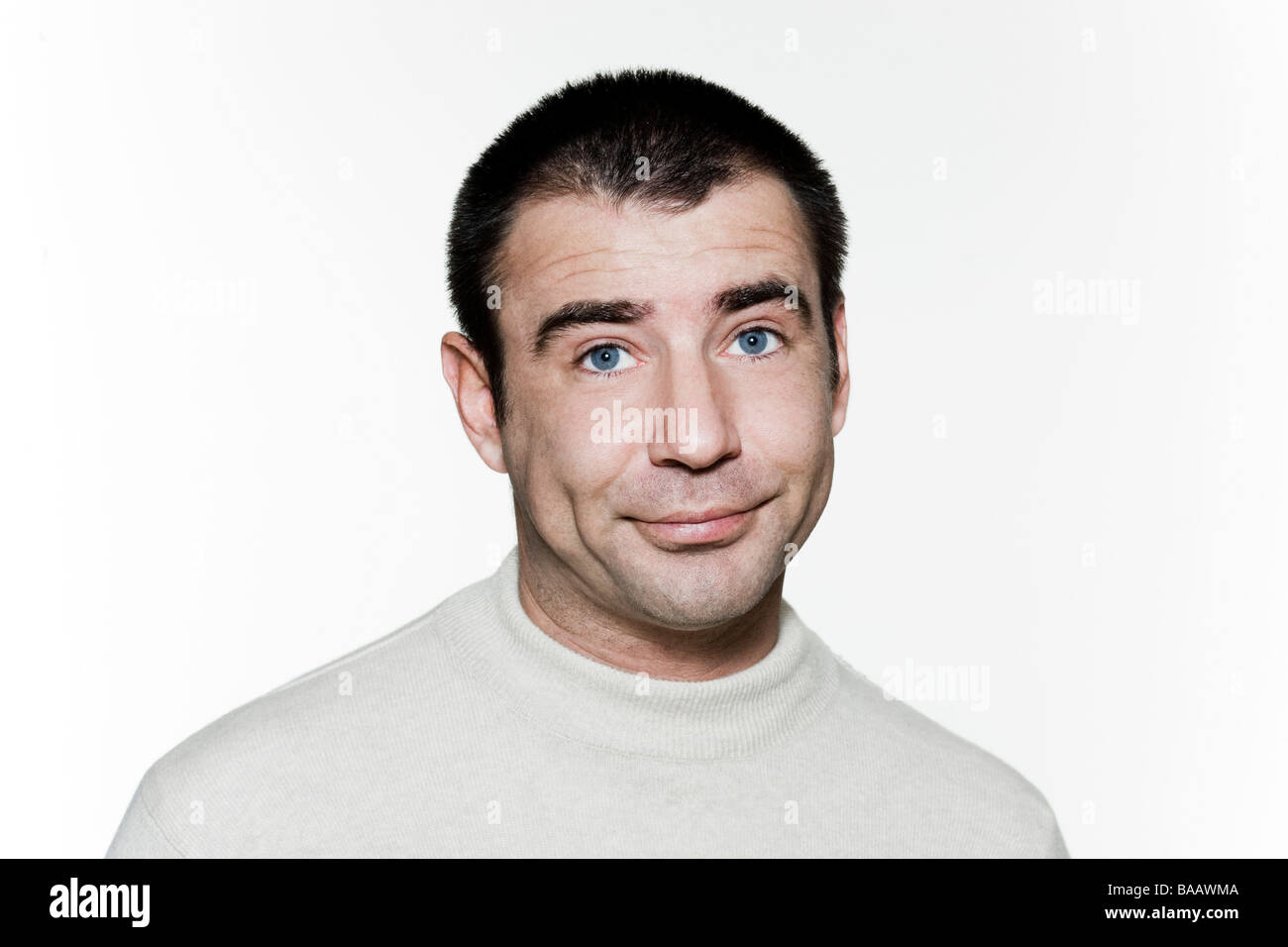 Portrait of an handsome expressive man in studio on white isolated ...