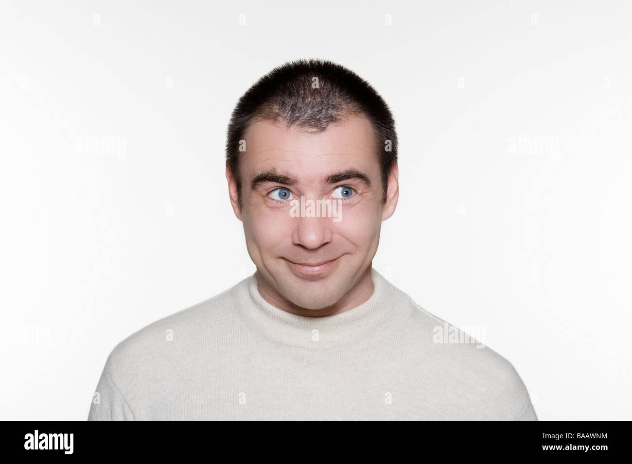 Portrait of an handsome expressive man in studio on white isolated ...