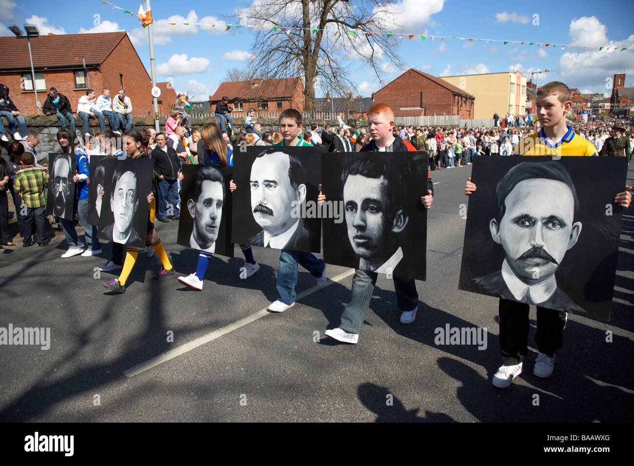 marchers carry portraits of the martyred original members of the easter ...
