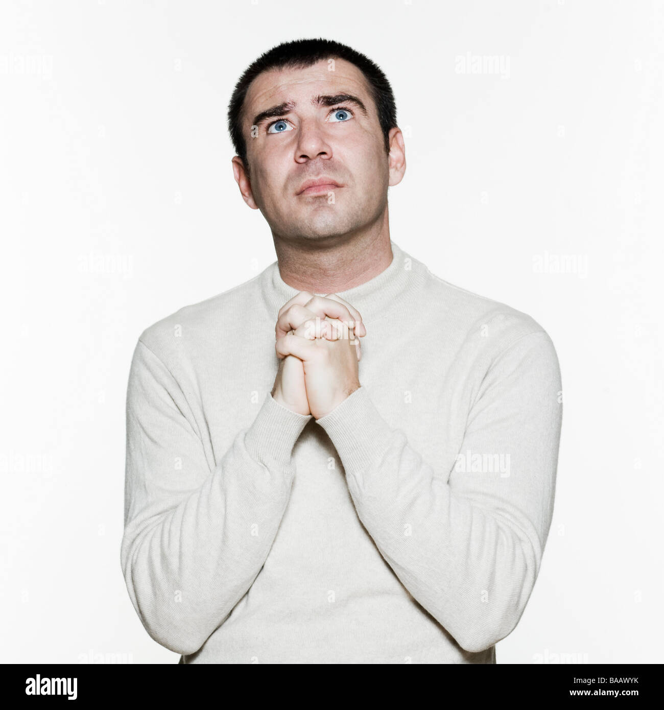 Portrait of an handsome expressive man in studio on white isolated ...
