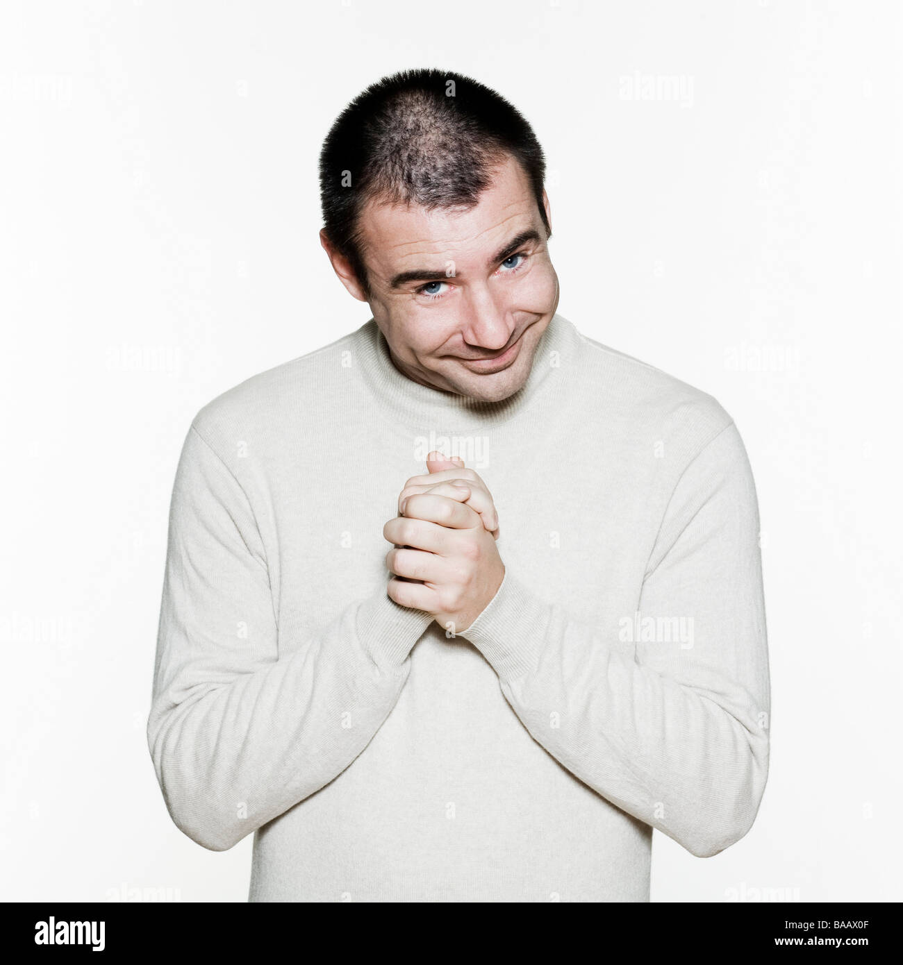 Portrait of an handsome expressive man in studio on white isolated ...
