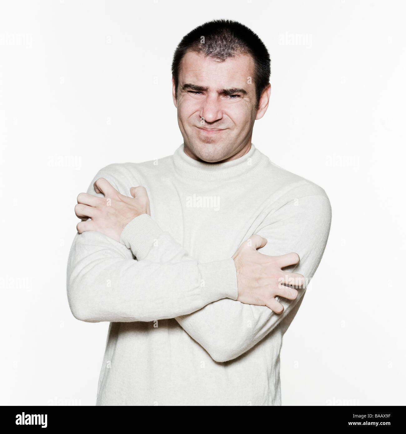 Portrait of an handsome expressive man in studio on white isolated ...