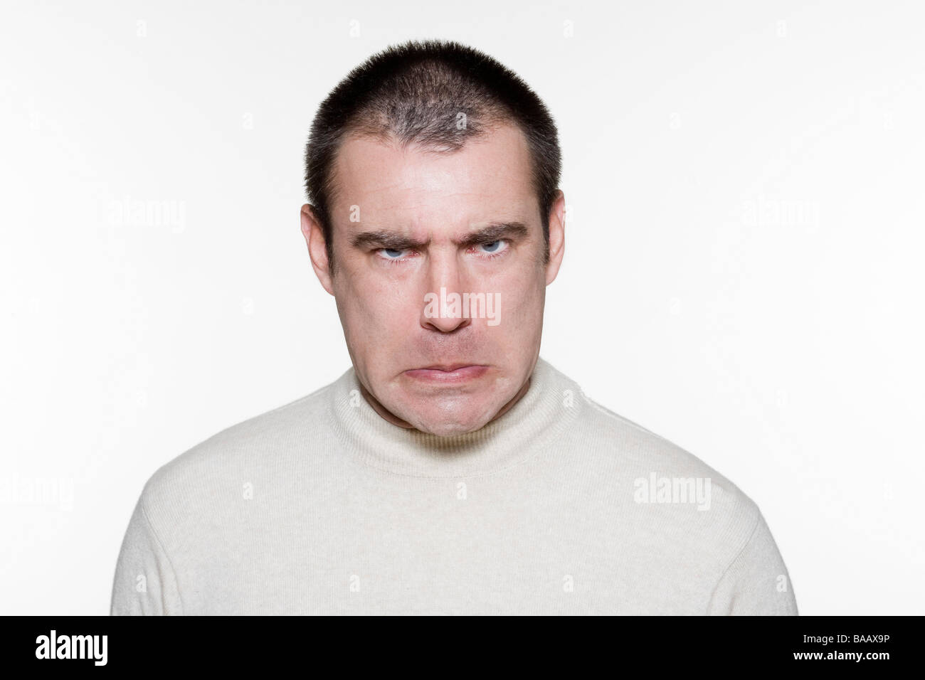 Portrait of an handsome expressive man in studio on white isolated ...