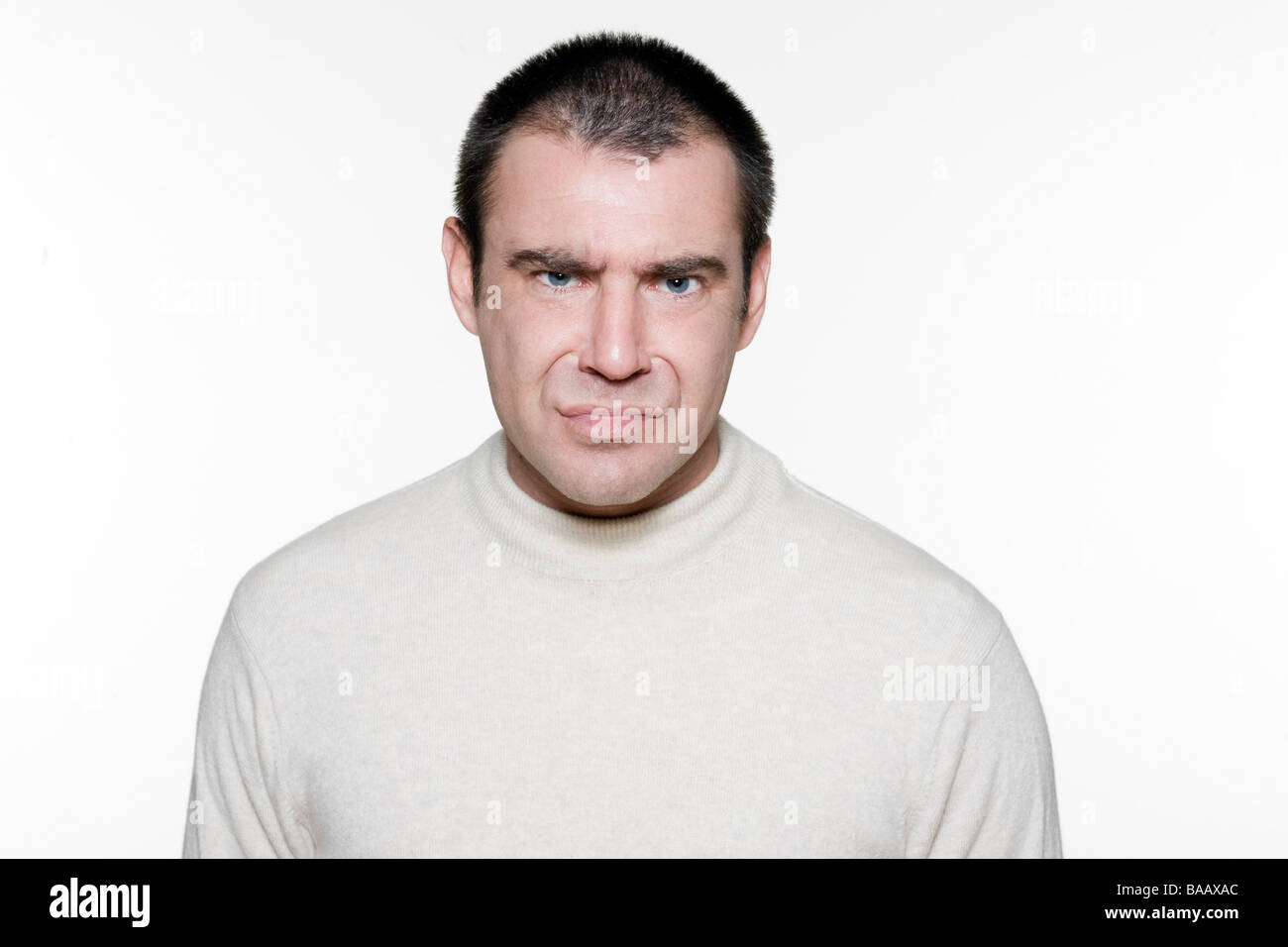 Portrait of an handsome expressive man in studio on white isolated ...