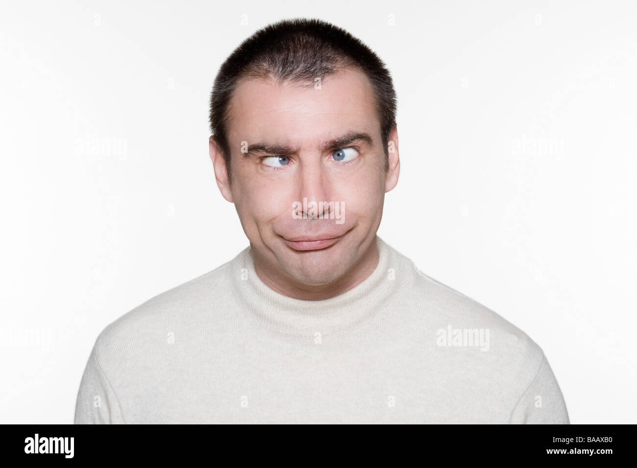 Portrait of an handsome expressive man in studio on white isolated ...