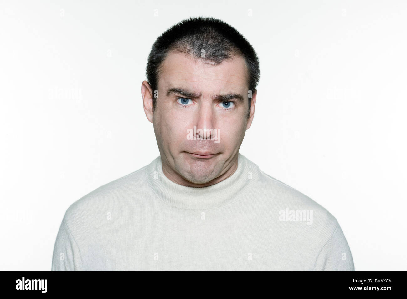 Portrait of an handsome expressive man in studio on white isolated ...
