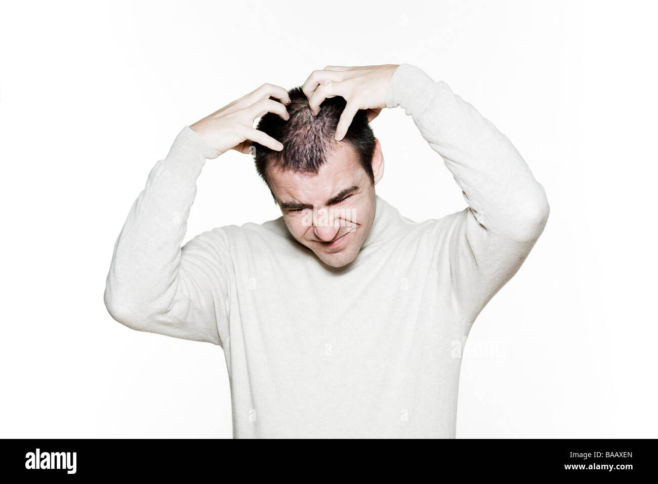 Portrait of an handsome expressive man in studio on white isolated ...