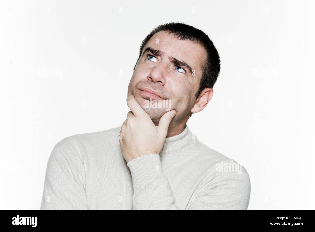 Portrait of an handsome expressive man in studio on white isolated ...