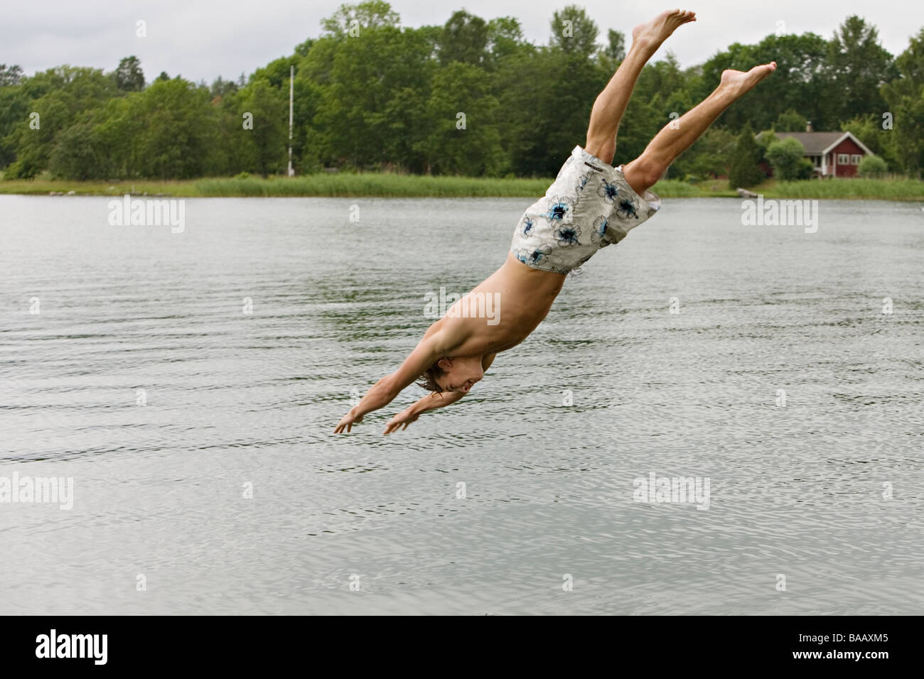 Adult leaping and diving hi-res stock photography and images - Alamy