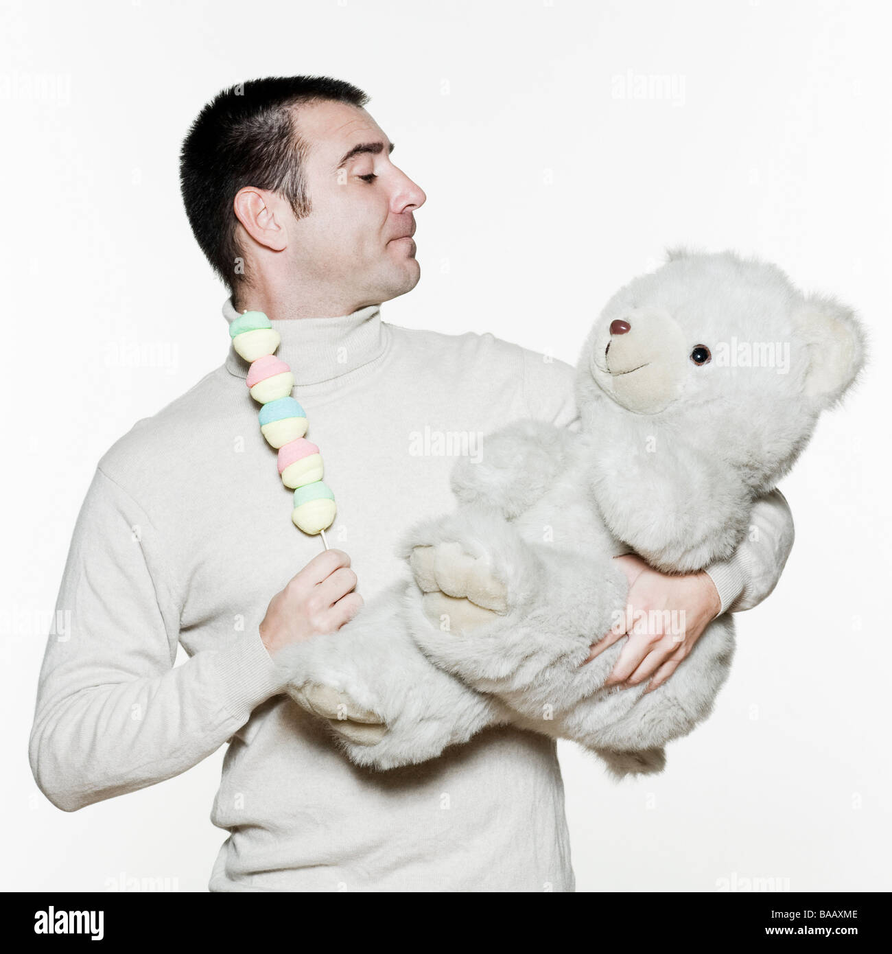 Portrait of an handsome expressive man in studio on white isolated ...