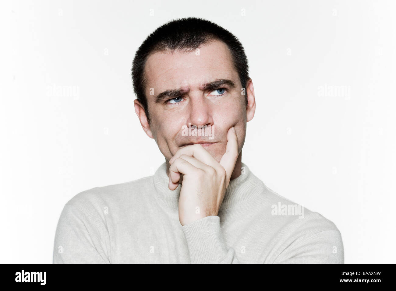 Portrait of an handsome expressive man in studio on white isolated ...