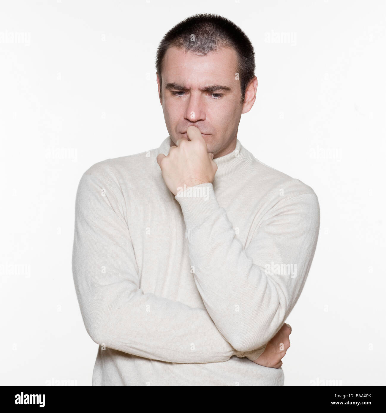 Portrait of an handsome expressive man in studio on white isolated ...
