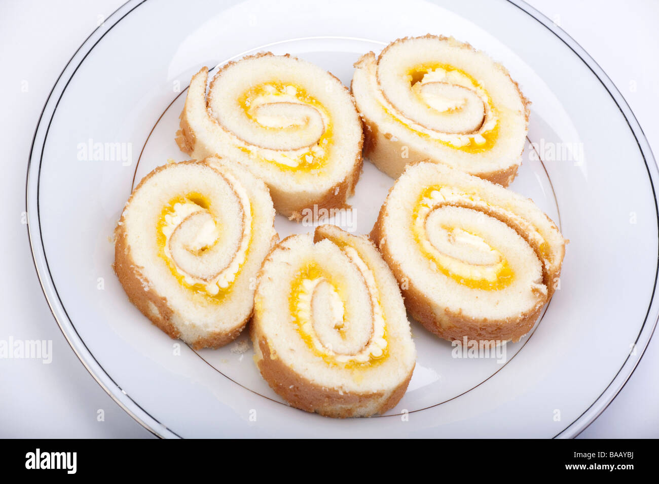 lemon swiss roll slices Stock Photo - Alamy