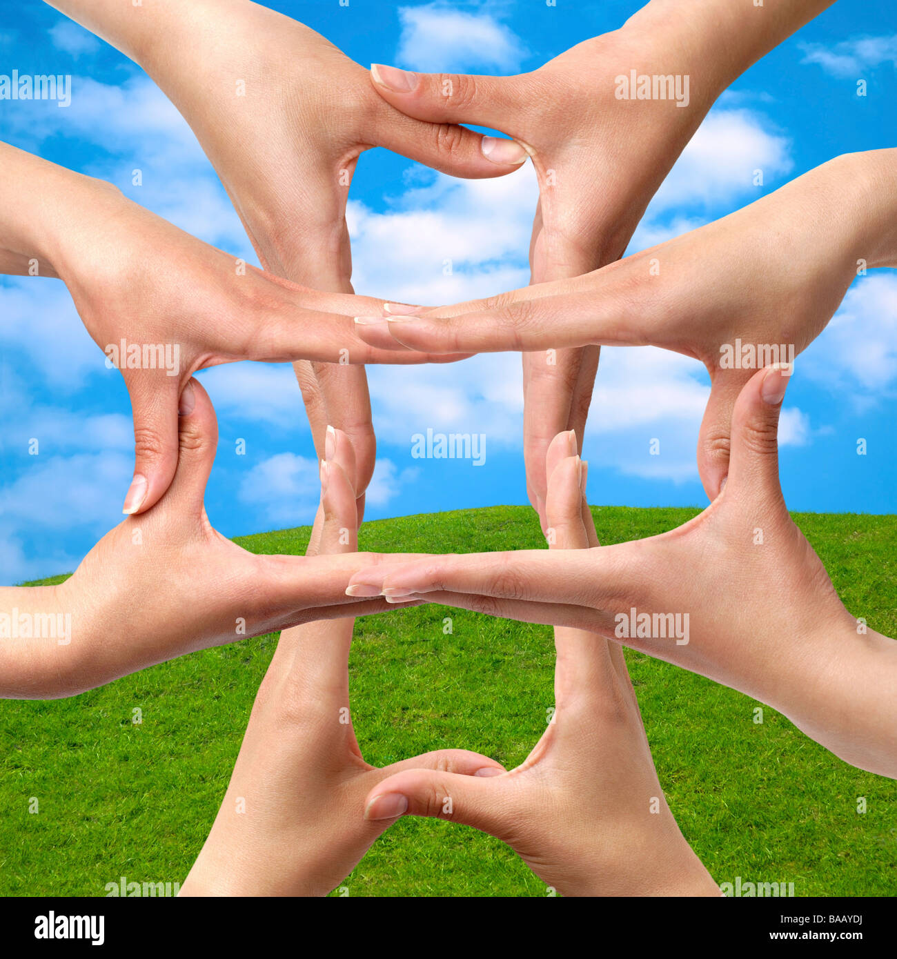 Conceptual Cross From Hands Stock Photo - Alamy