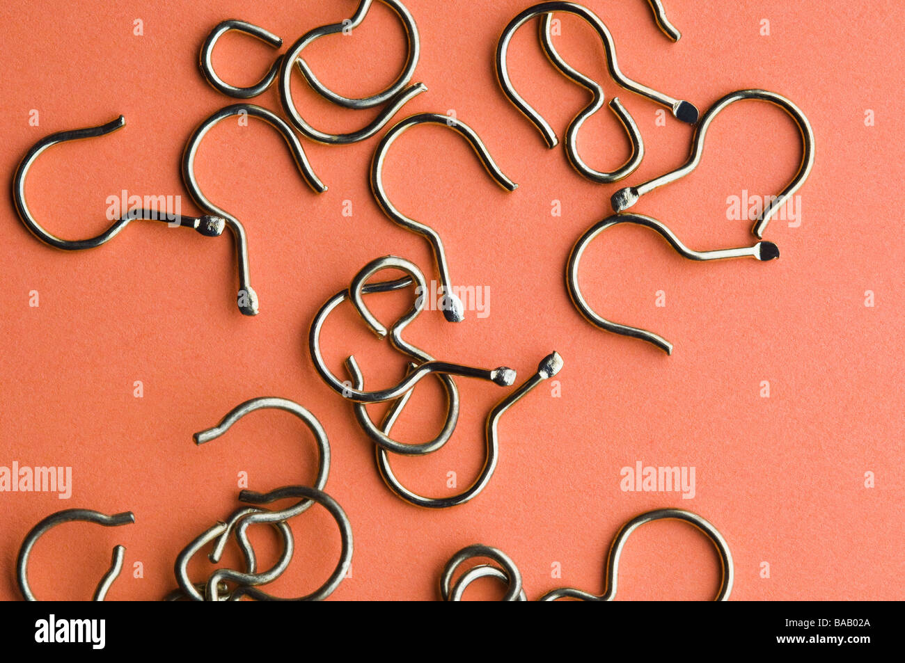 Close-up of curtain hooks Stock Photo - Alamy
